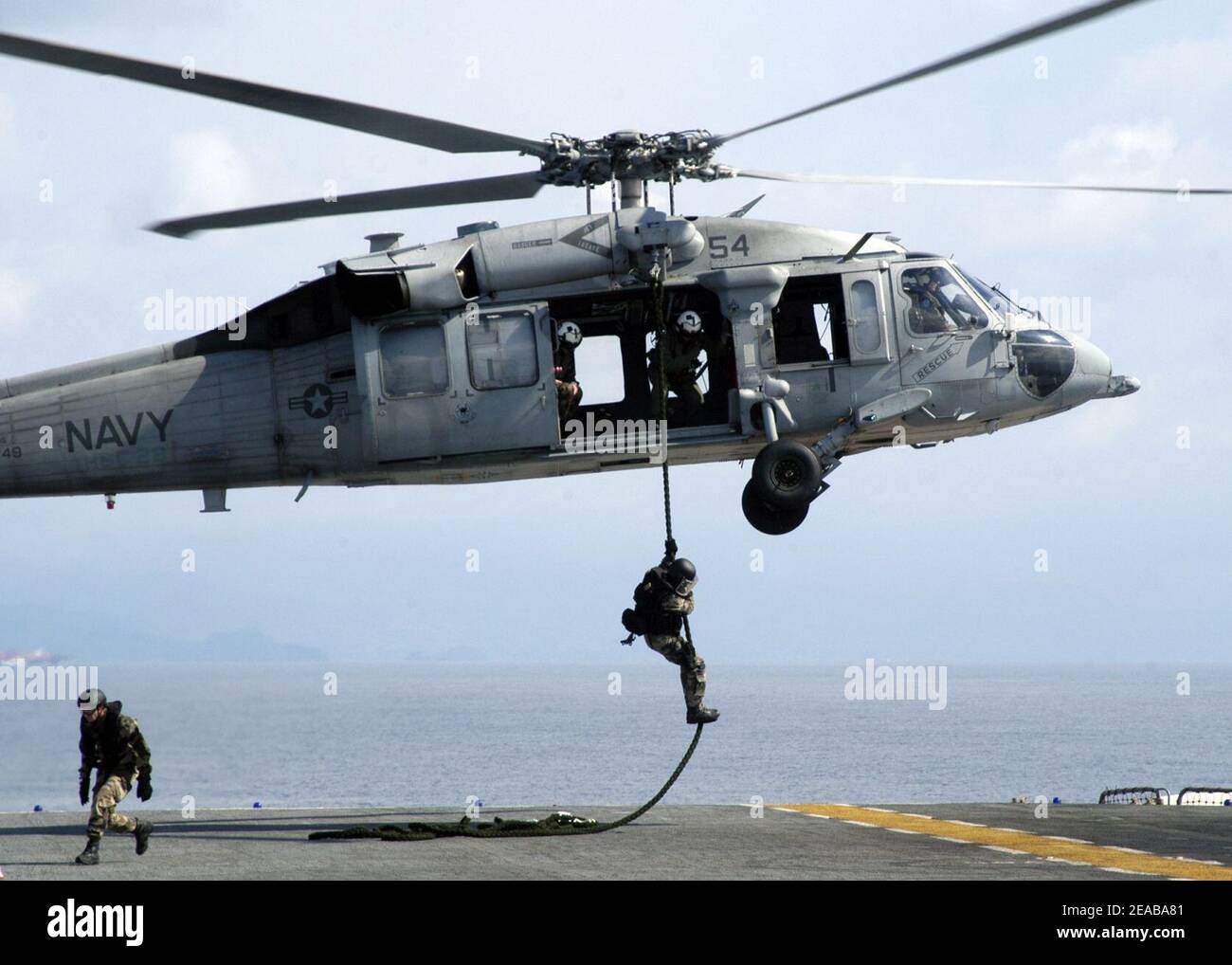Navy Chopper, French Boarding Teams in Practice Rappel Stock Photo - Alamy