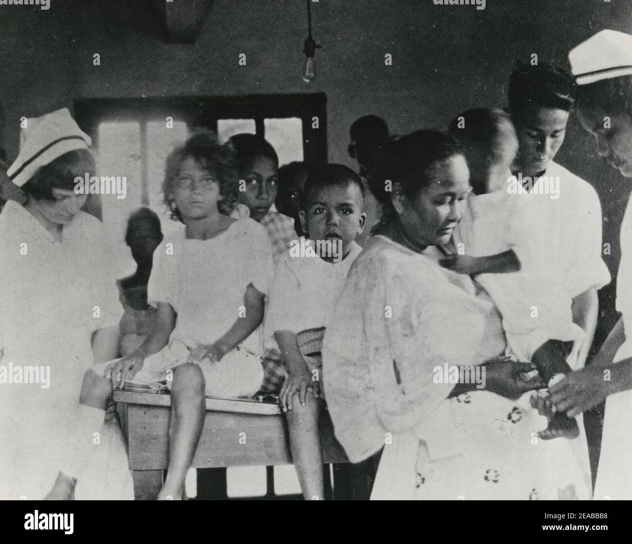 Navy nurses rendering aid in Guam -- 1940s Stock Photo - Alamy