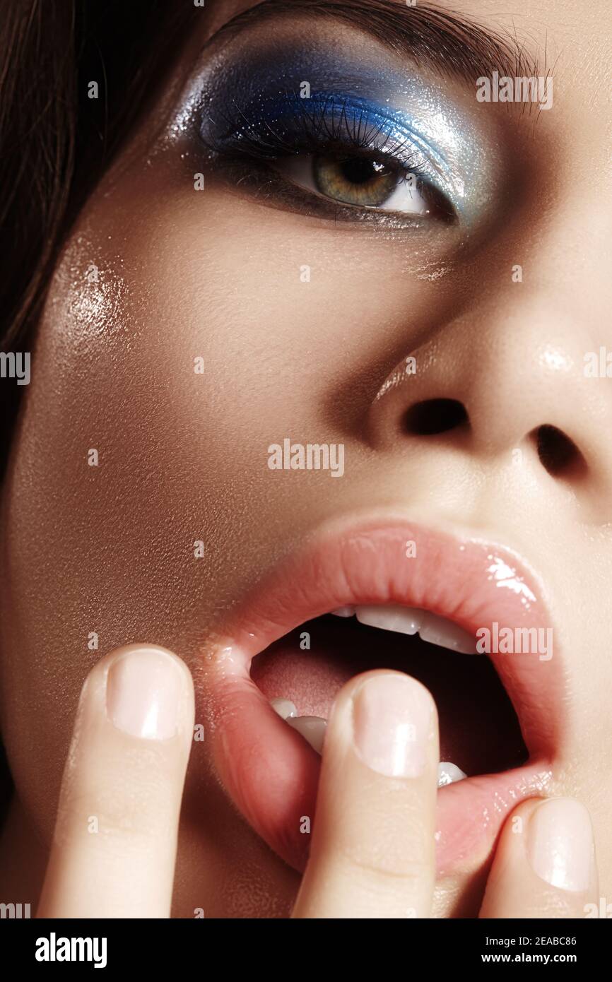 Closeup portrait with of beautiful woman face. Fashion makeup, clean ...