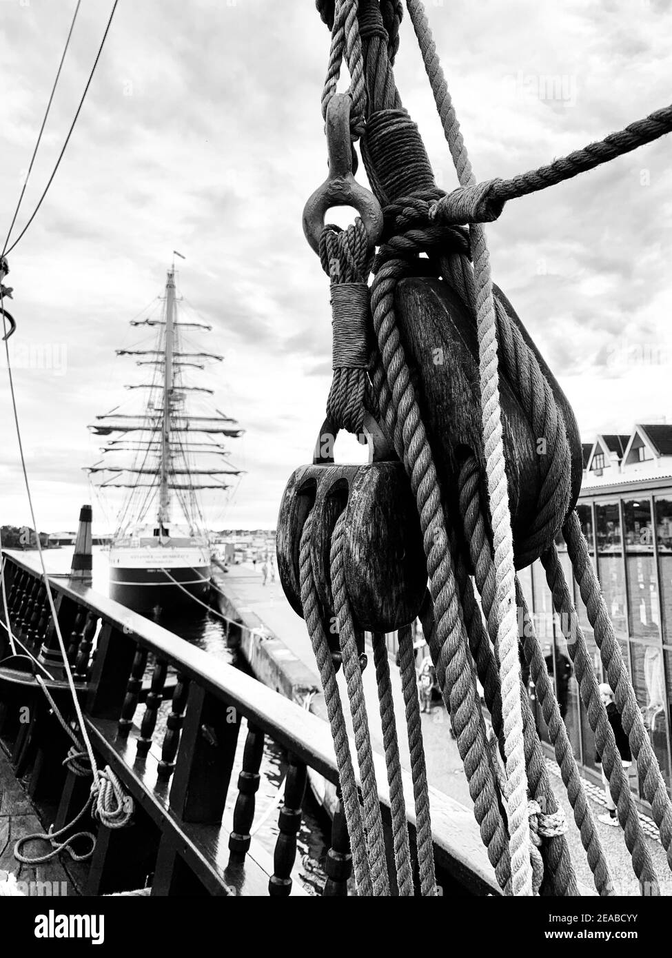 Wooden ship blocks braced with ropes on the historic merchant ship Lisa ...