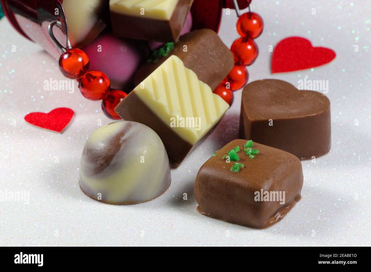 Chocolate Truffle Bucket And Red Hearts On Textured White Stock Photo ...