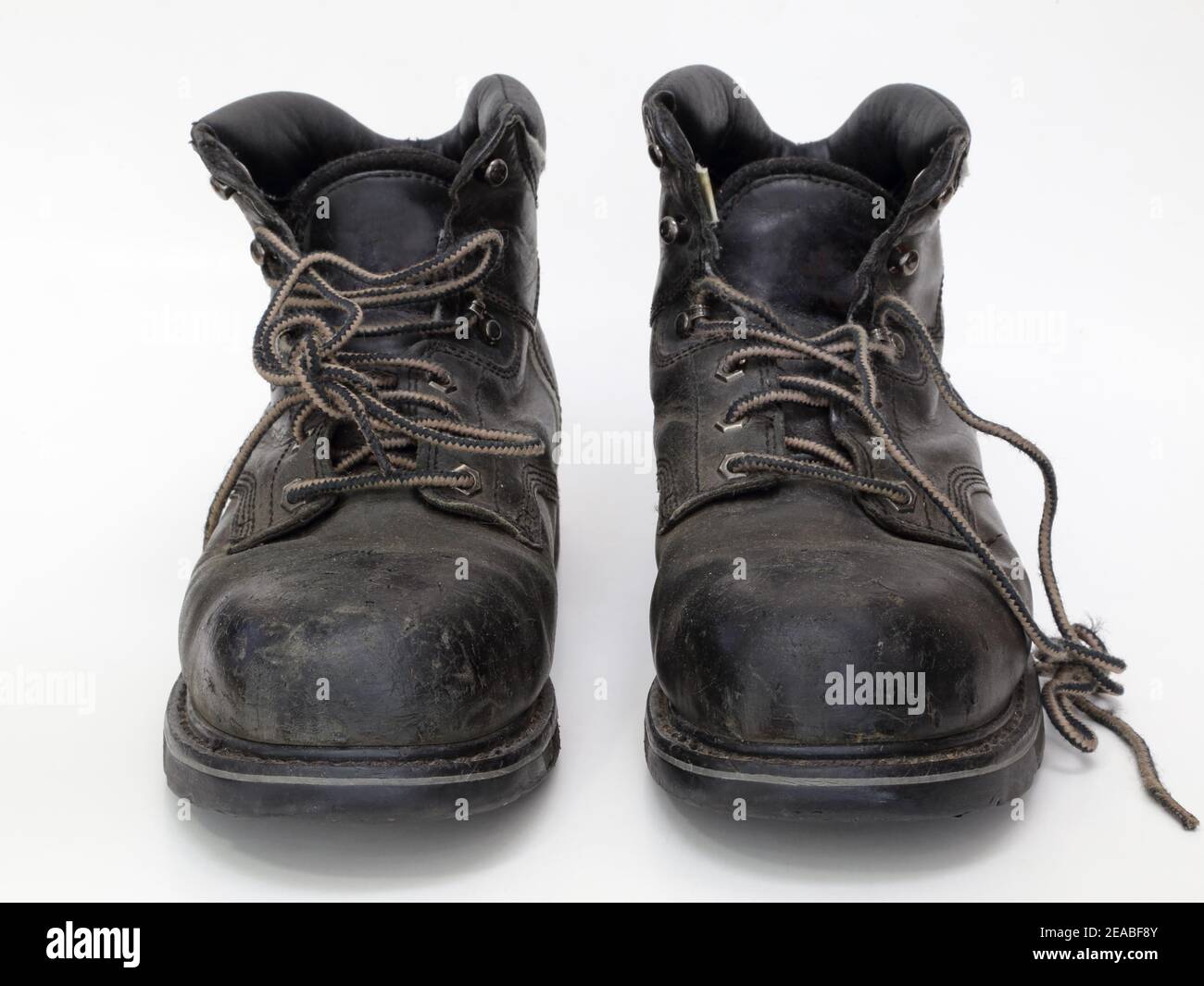 Old black leather work boots hi-res stock photography and images - Alamy