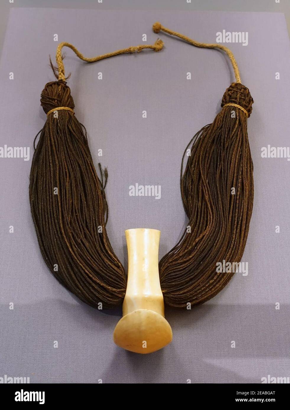 Whale tooth necklace hi-res stock photography and images - Alamy
