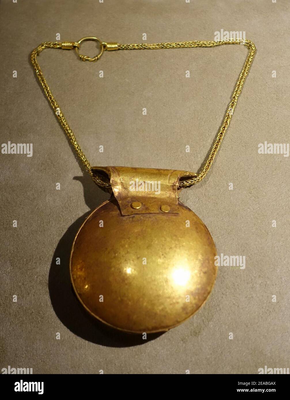 Bulla necklace hi-res stock photography and images - Alamy