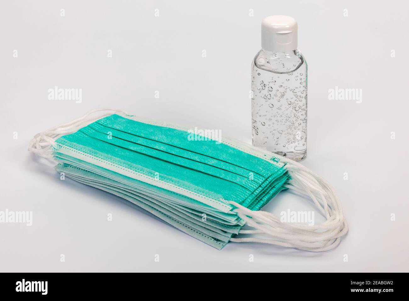 Hand disinfectant, hygiene hand gel, green mouth nose protective masks ...