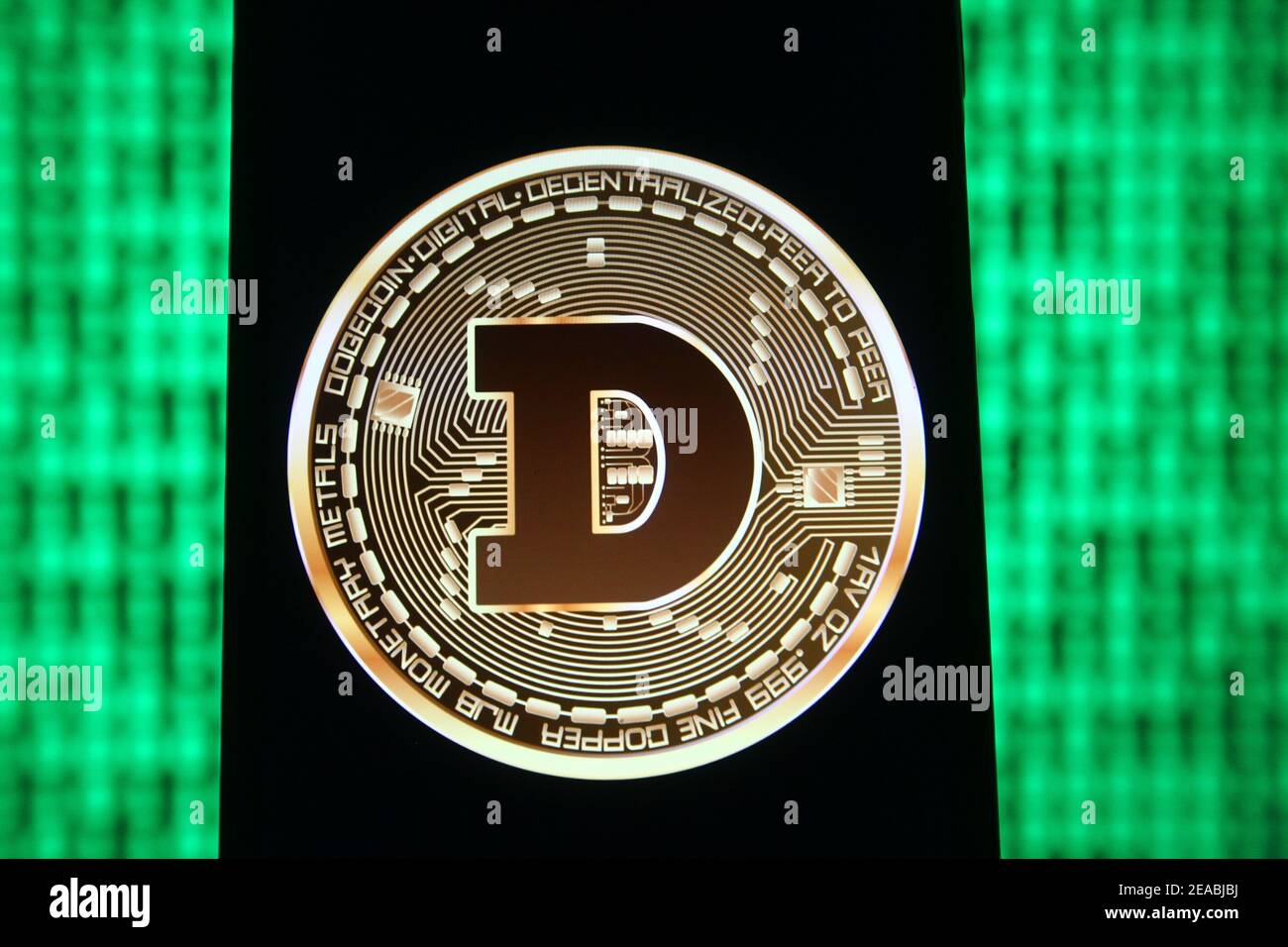 In this photo illustration a Dogecoin sign of a digital cryptocurrency ...
