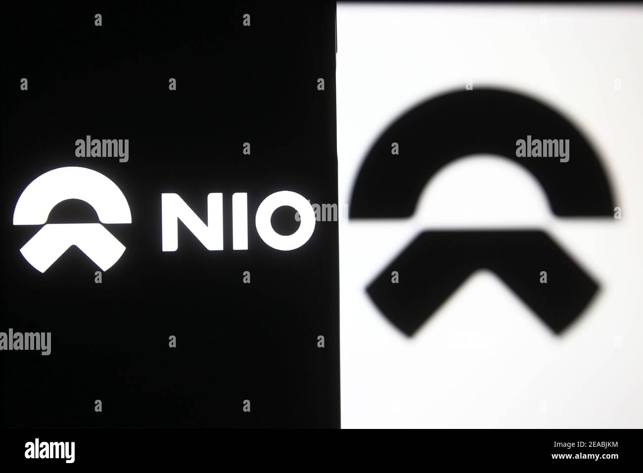 In this photo illustration a NIO logo of a Chinese car manufacturer is ...