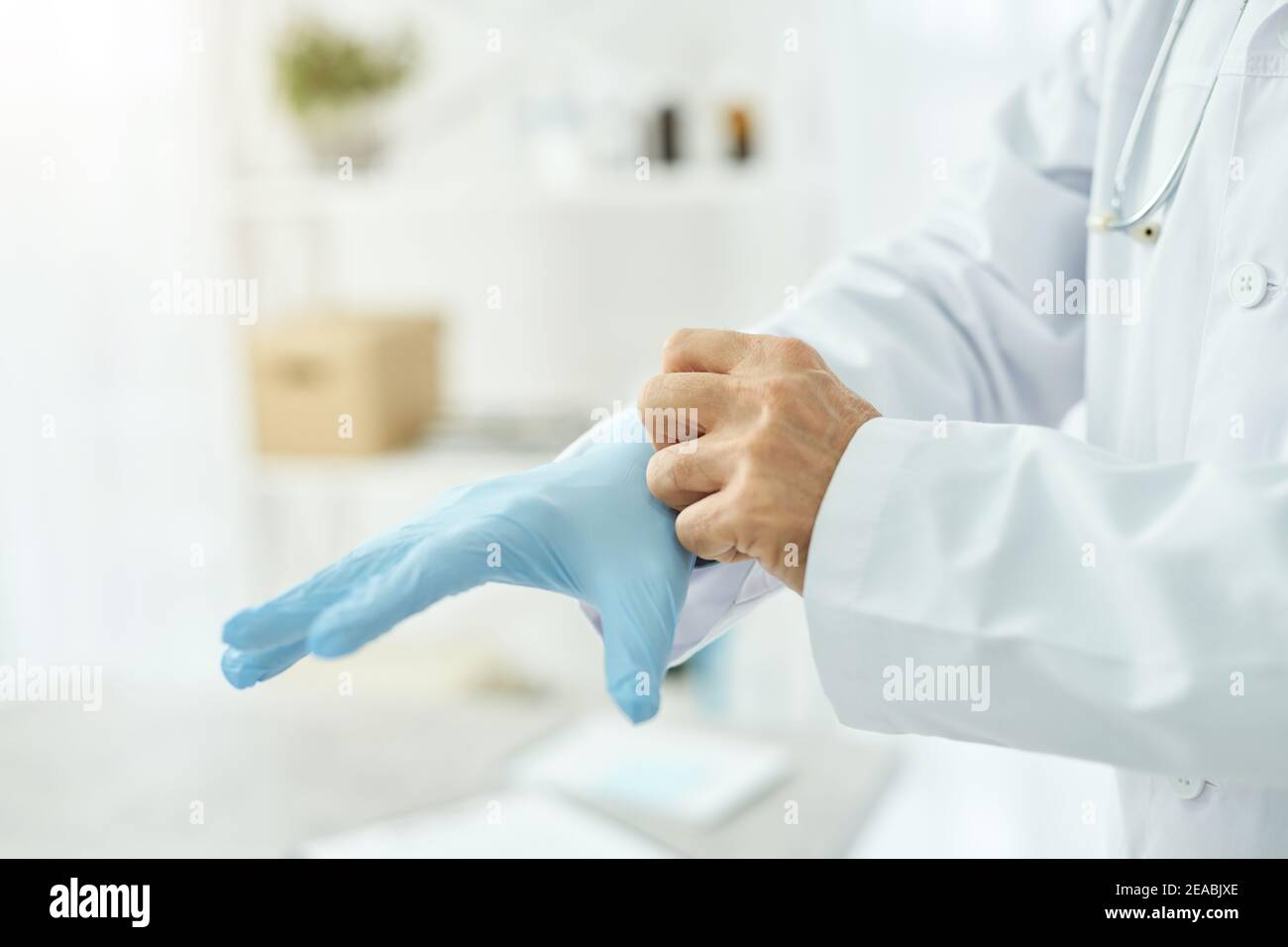 Scientist doctor in blue disposable hi-res stock photography and images ...
