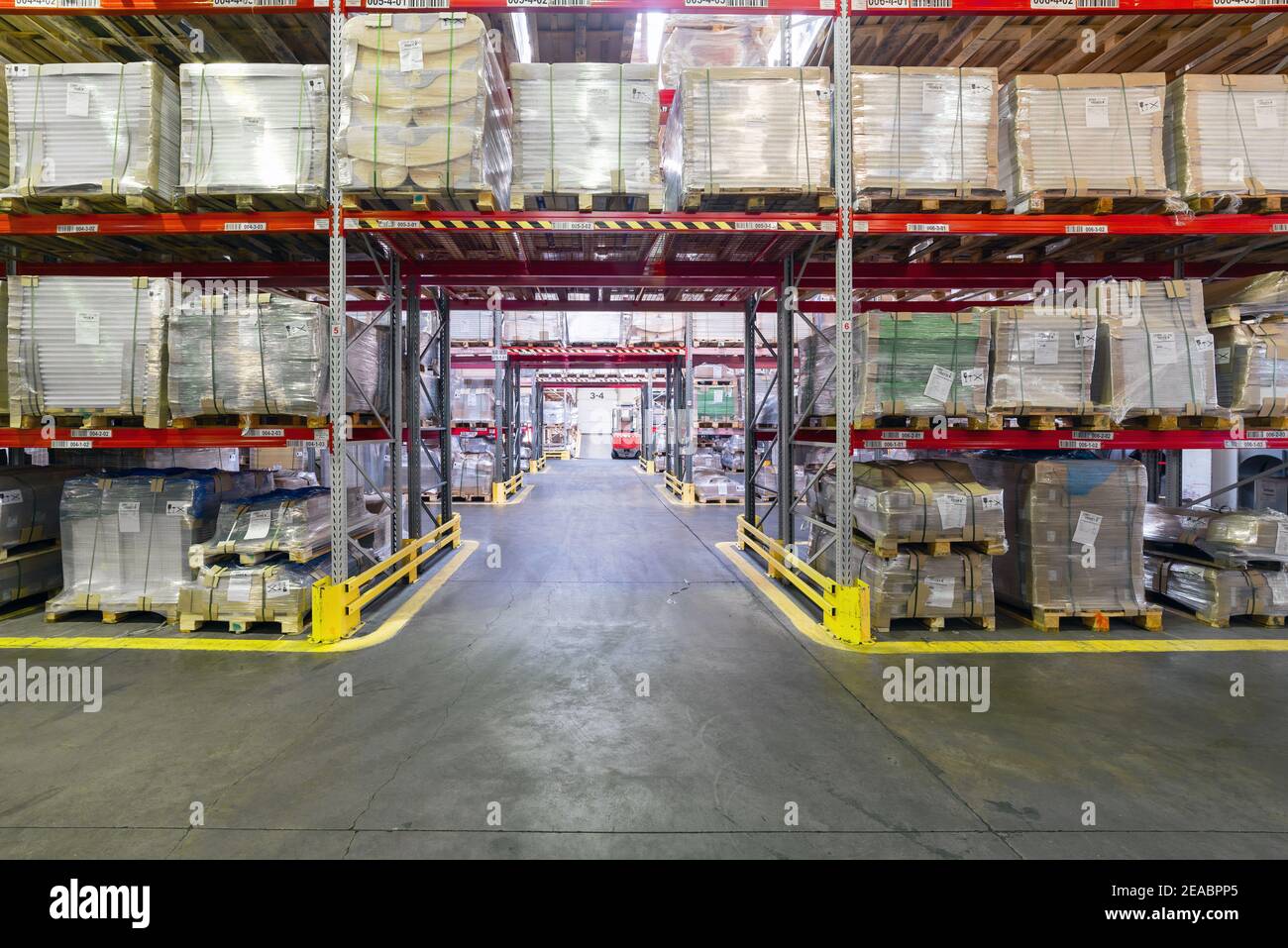 Finished goods warehouse, metal profile packed in bundles Stock Photo ...