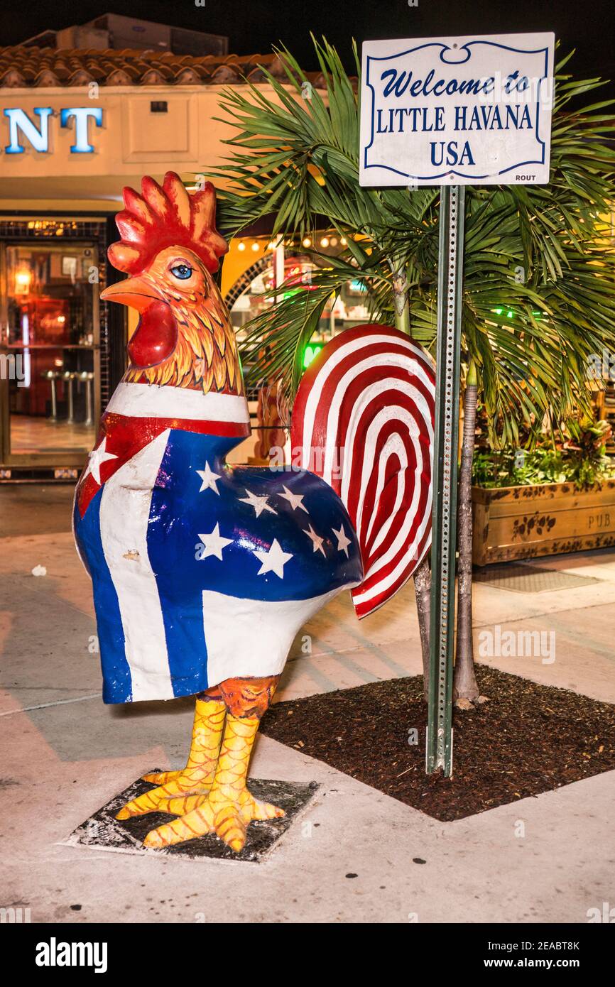 Rooster statue painted with American and Cuban flag colors next to the ...