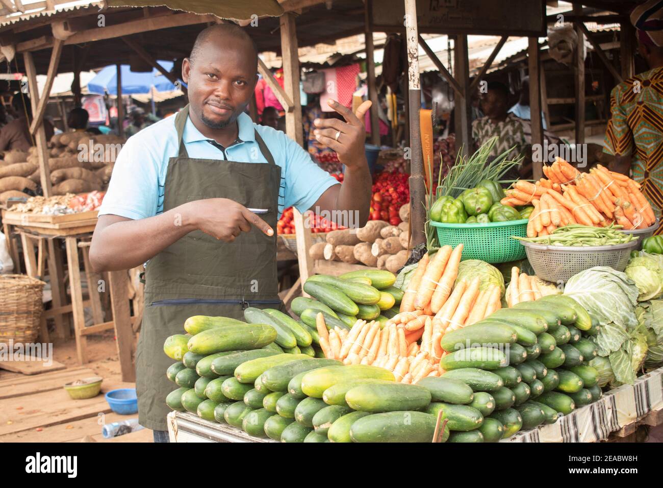 Black man selling fruits vegetables hi-res stock photography and images ...