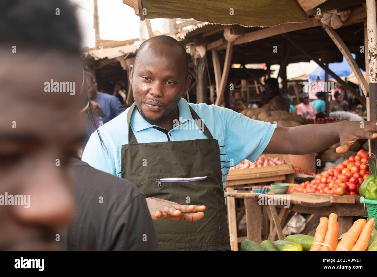 a man in a local market Stock Photo - Alamy