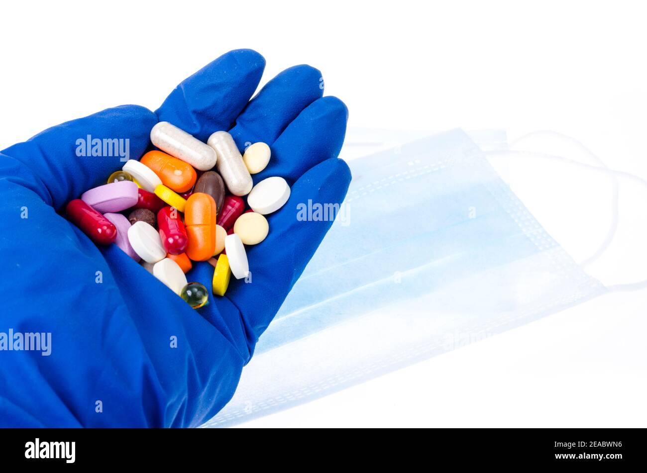 Medication dosage hand glove pill hi-res stock photography and images ...