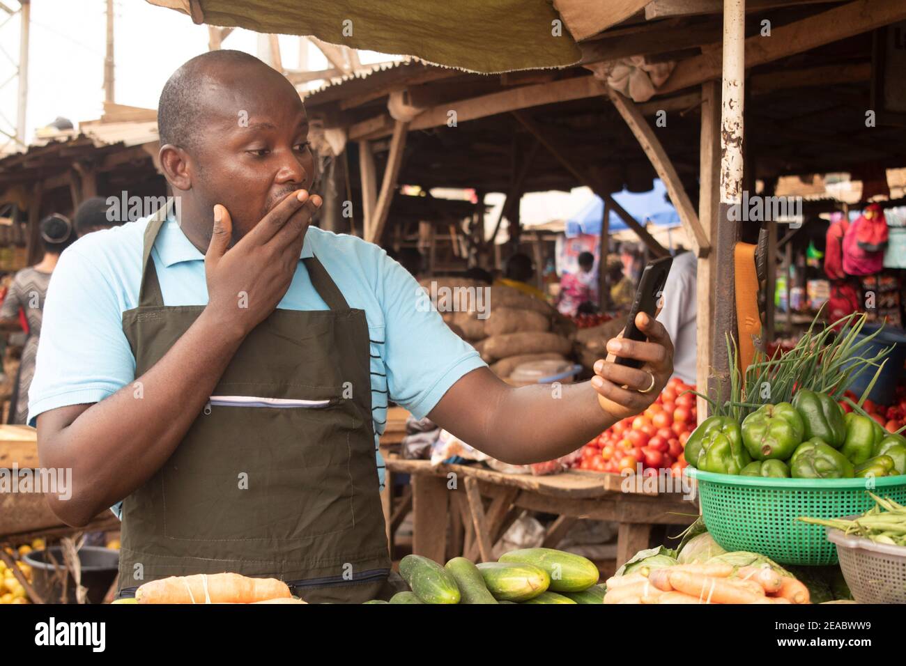 Hand over mouth african hi-res stock photography and images - Alamy