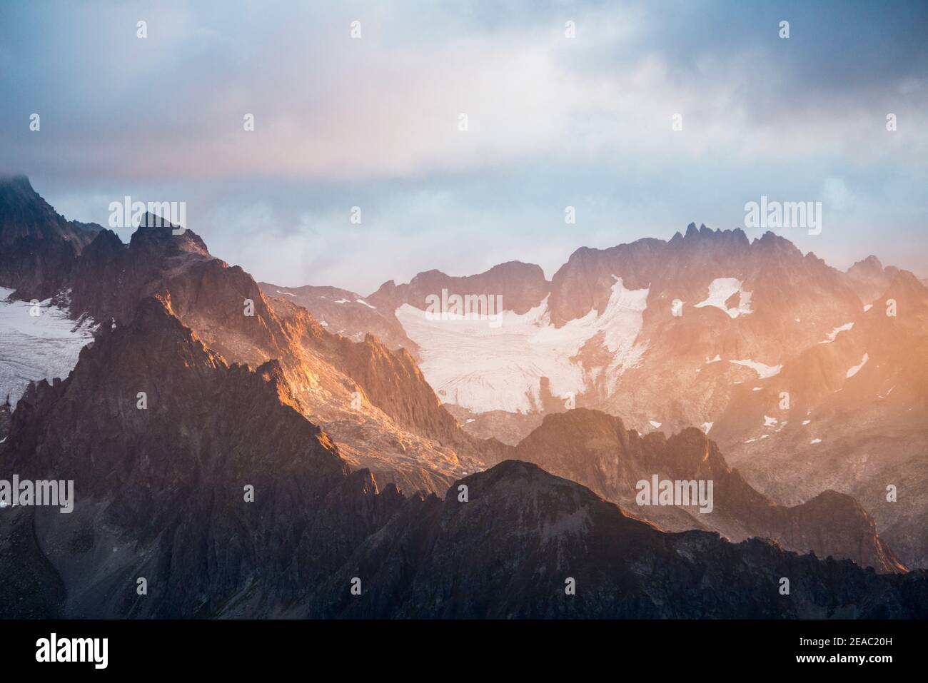 first rays of sun in the high mountains Stock Photo - Alamy