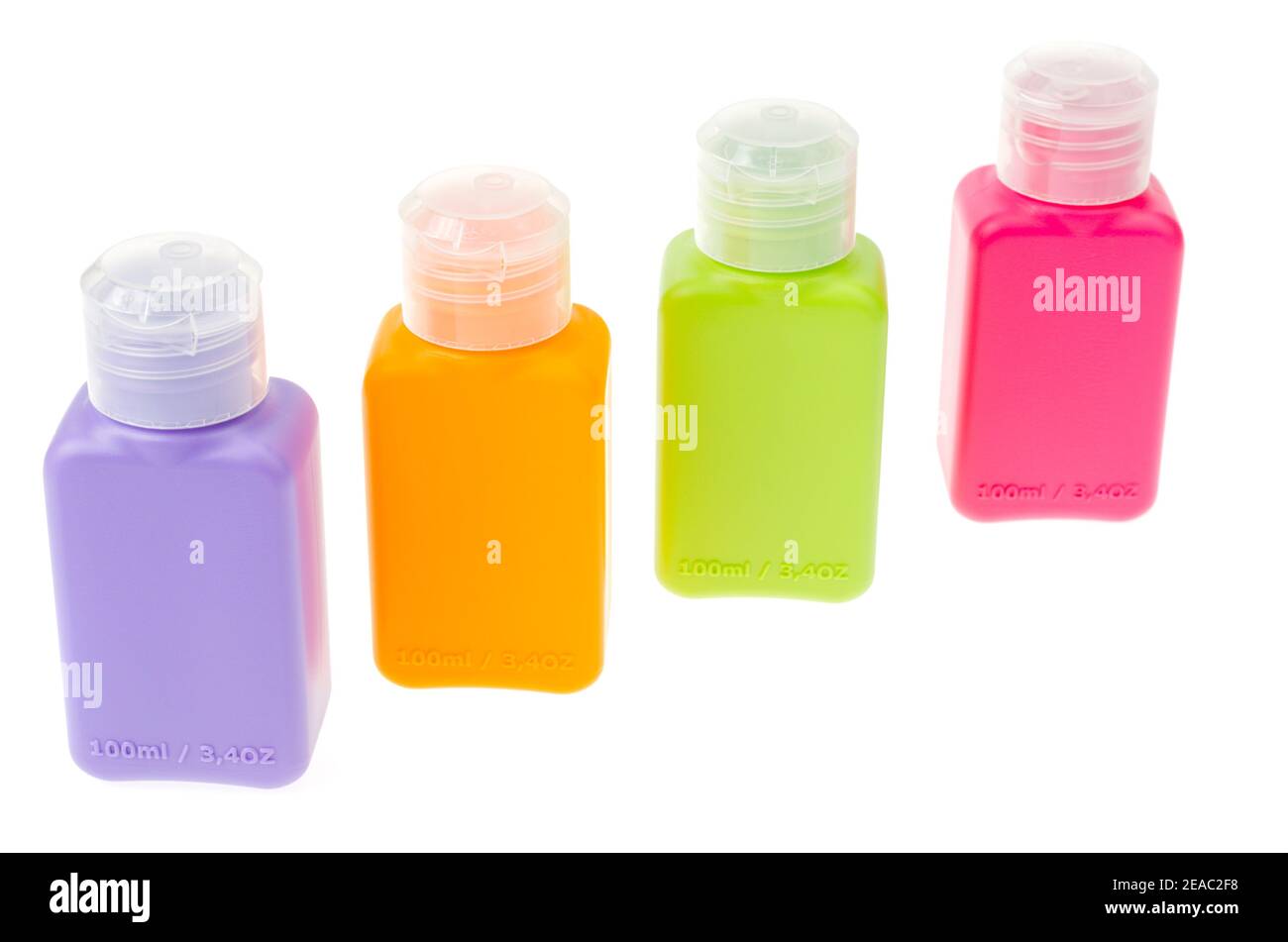 Multi-colored plastic bottles, containers isolated on white background ...