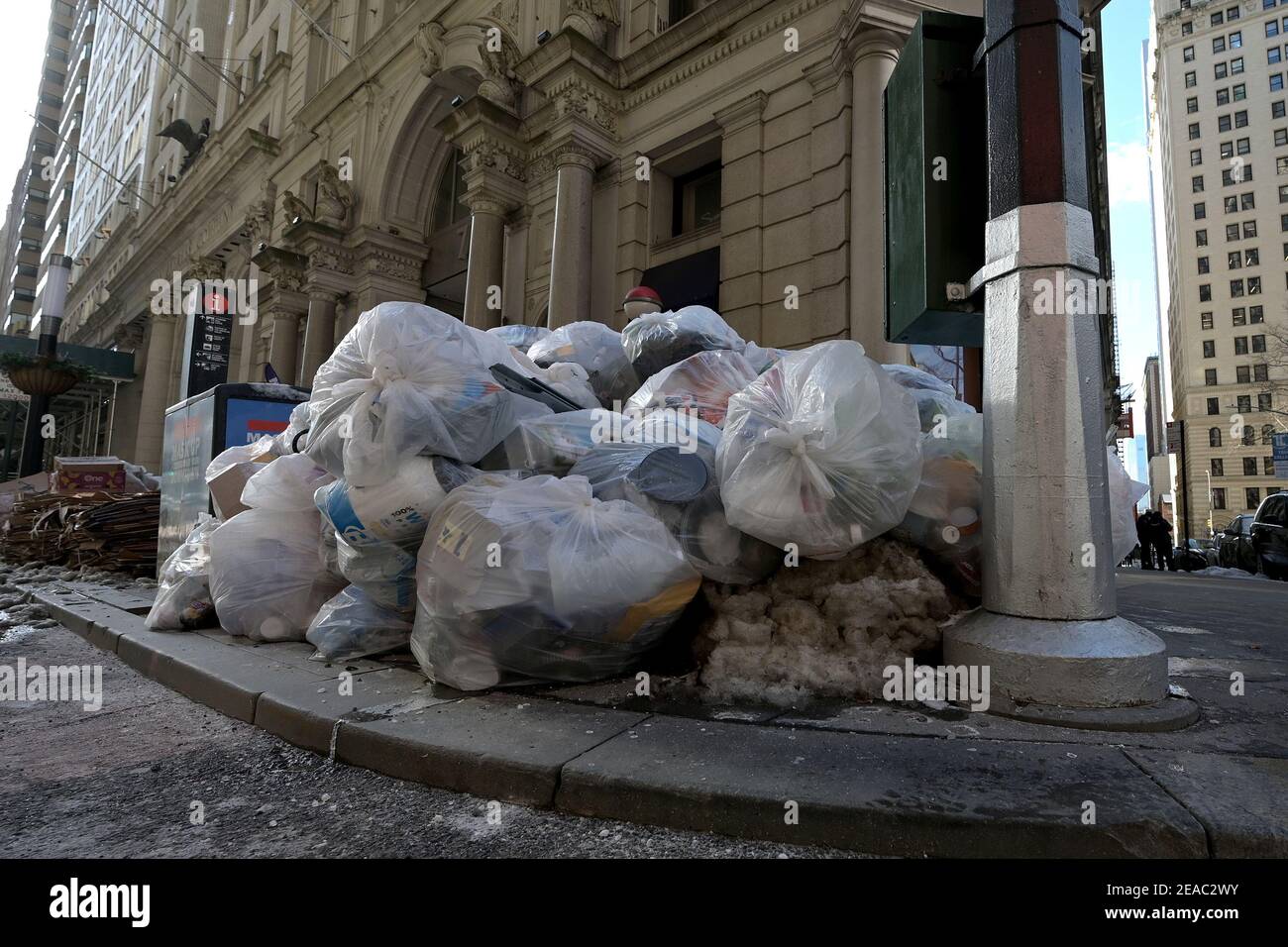 Piles of uncollected garbage seen in lower Manhattan, after two snow ...