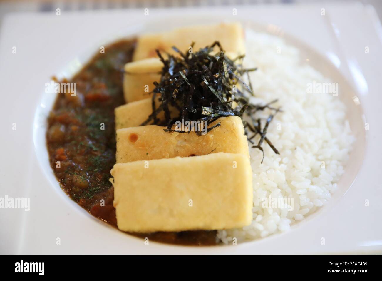 Curry rice with tofu japanese food Stock Photo - Alamy