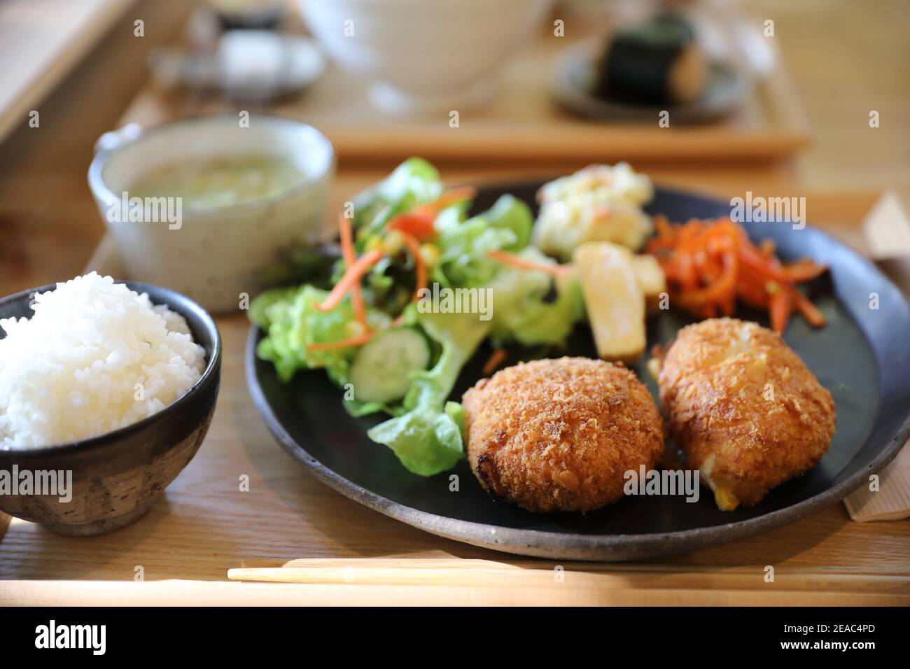 Beef Croquette with rice and salad japanese style Korokke on wooden ...