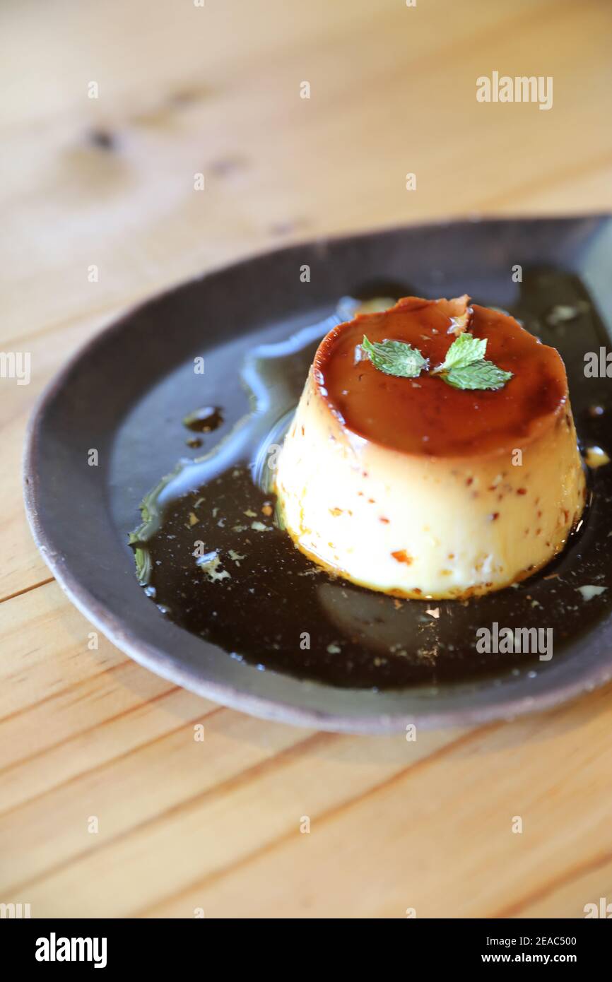 pudding on wood background japanese style Stock Photo - Alamy