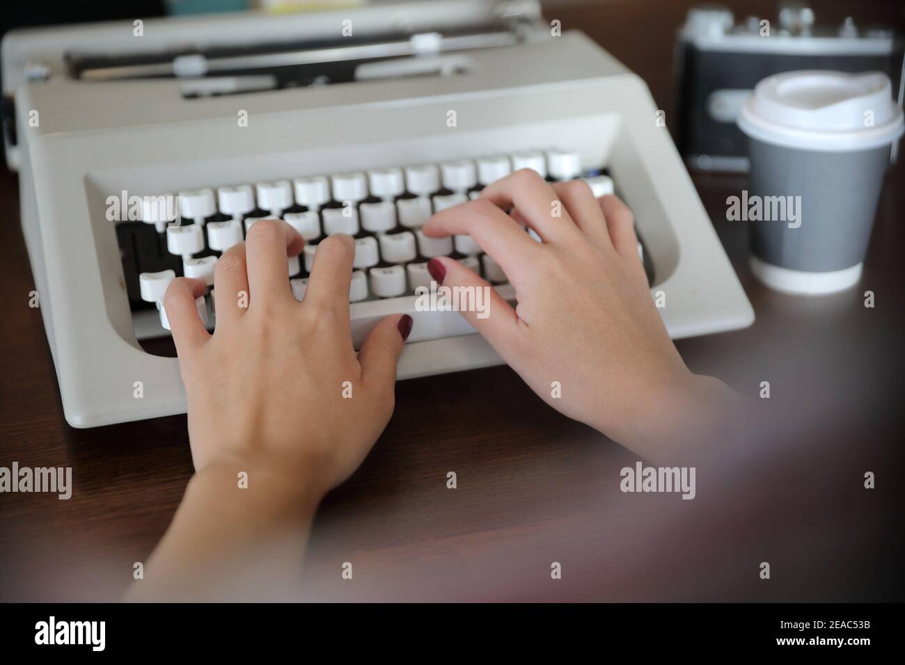 The Woman's Hands at The Typewriter Stock Photo - Alamy