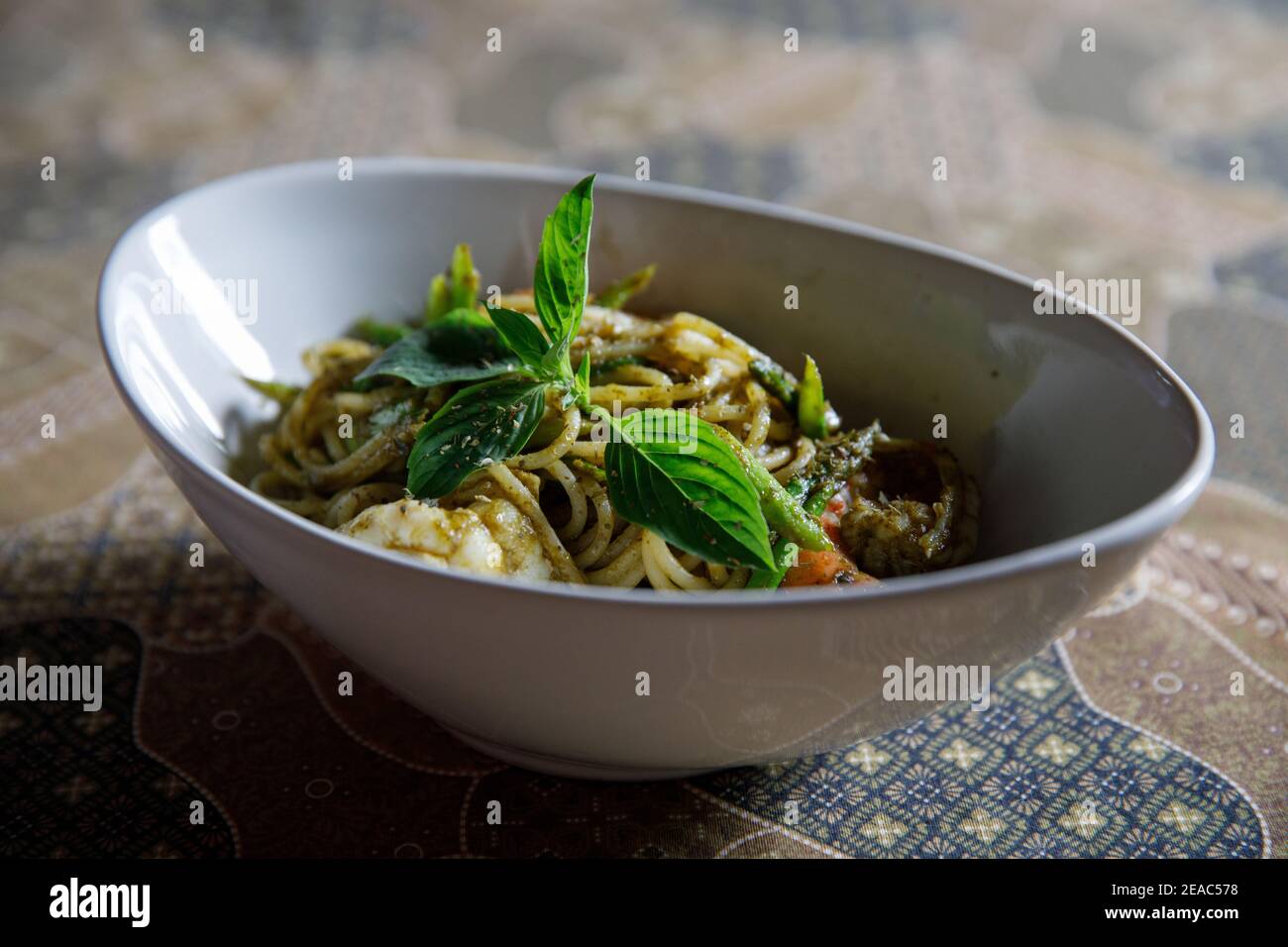 Pesto Spaghetti with shimp in high contrast italian food Stock Photo ...