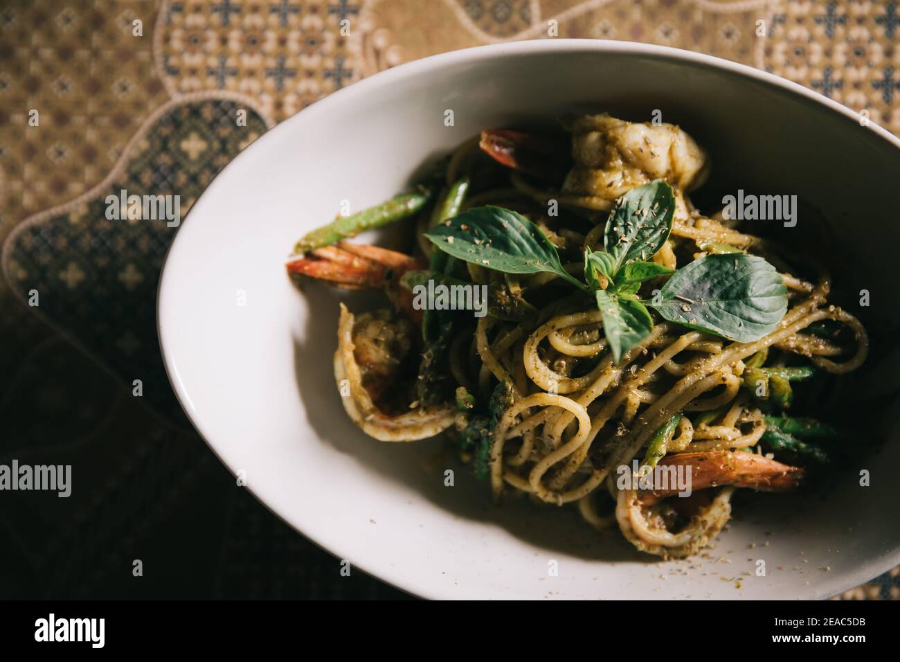 Pesto Spaghetti with shimp in high contrast italian food Stock Photo ...