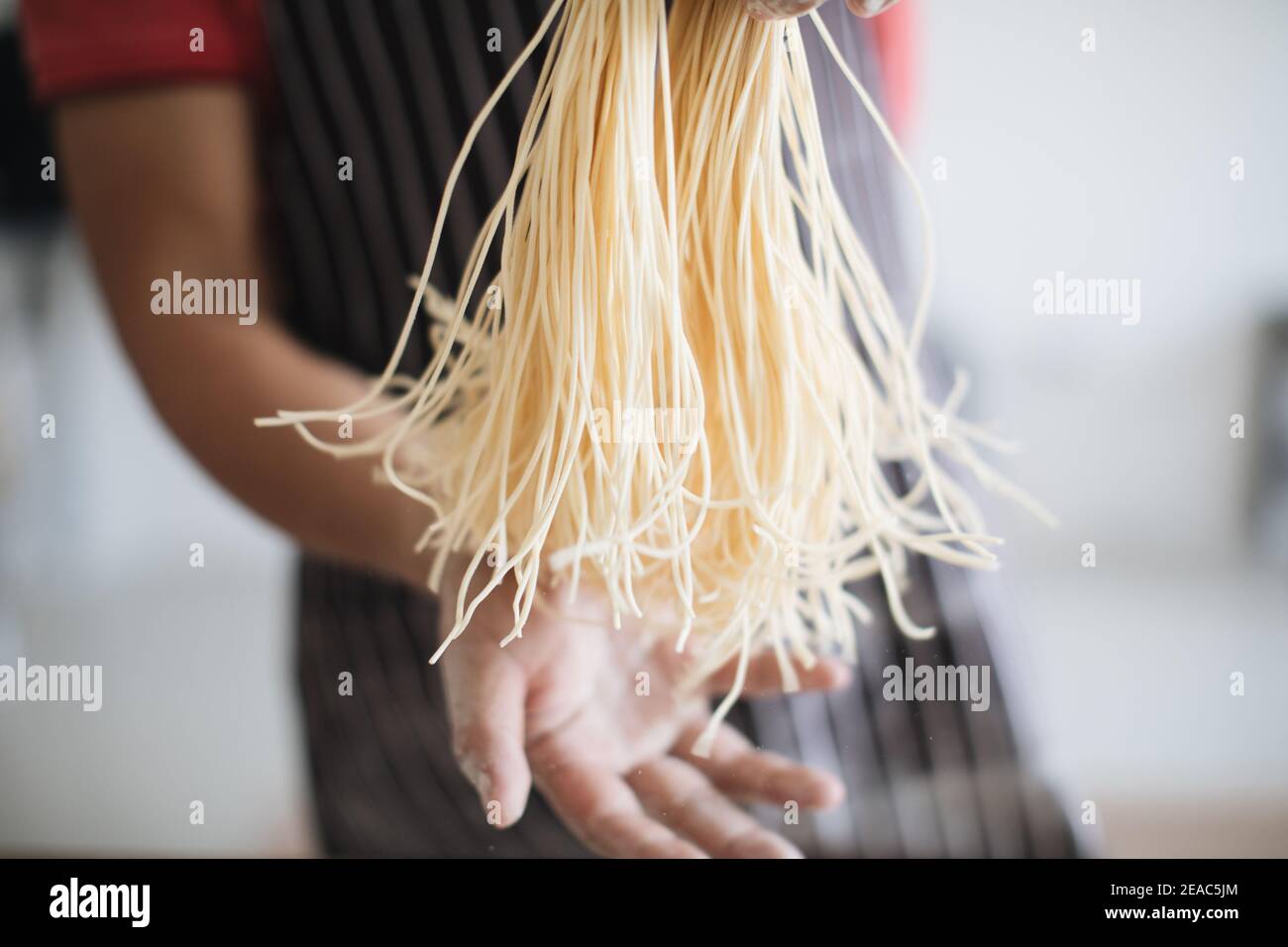 Fresh noodles chinese making chef hi-res stock photography and images ...