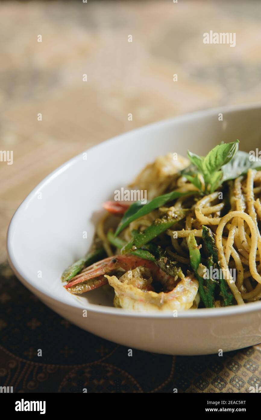 Pesto Spaghetti with shimp in high contrast italian food Stock Photo ...