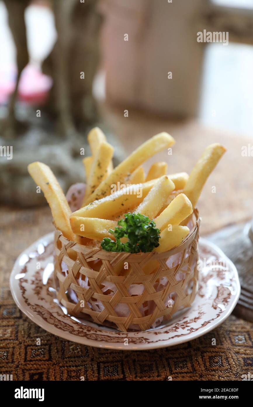 French fries in basket Stock Photo - Alamy