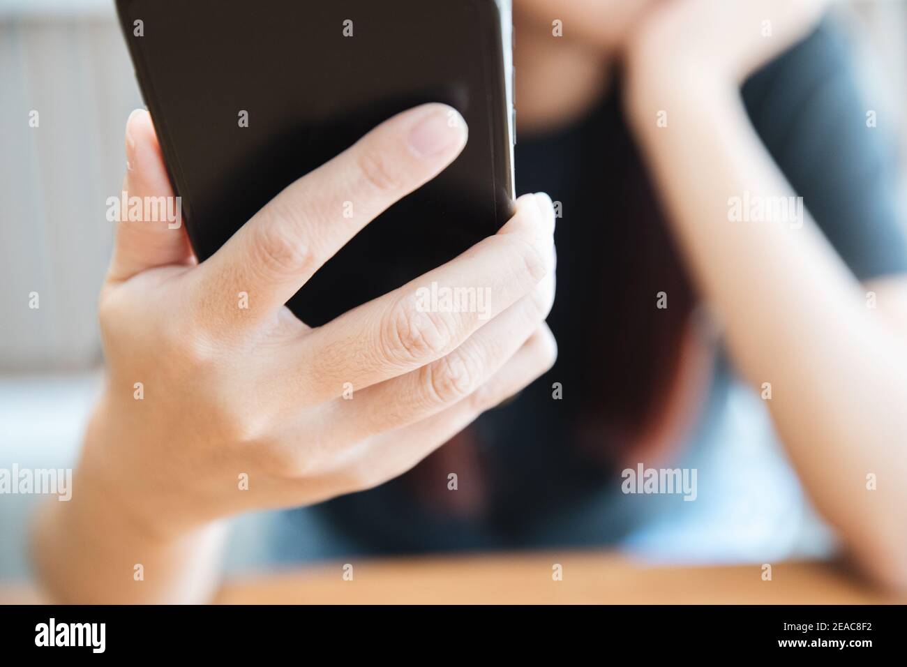 Hand using phone light hi-res stock photography and images - Alamy