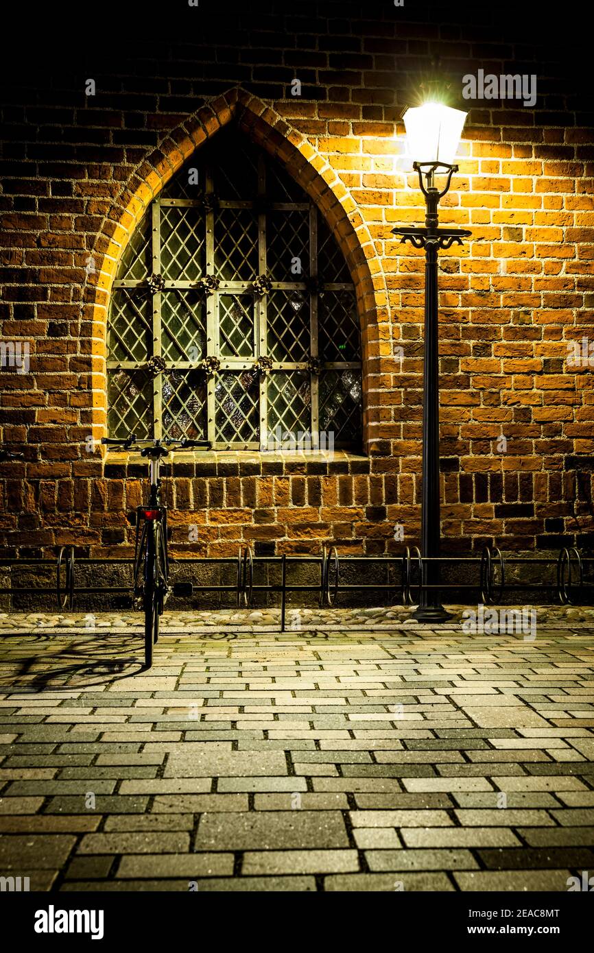 Illuminated street in Ribe, Denmark at night Stock Photo - Alamy