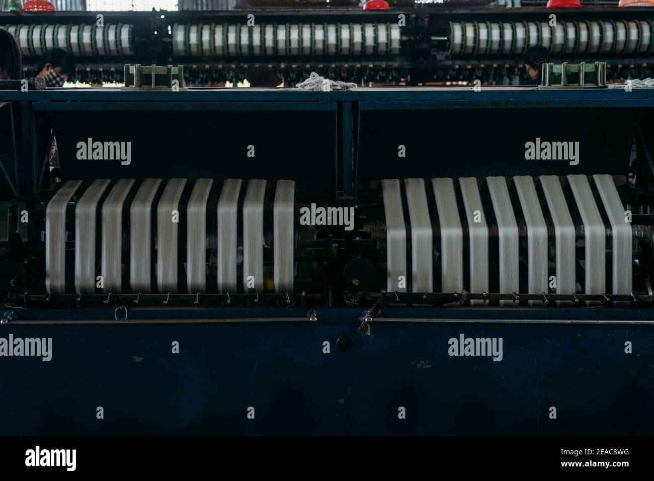 Silk Spinning machine spins silk thread at factory in Vietnam Stock ...