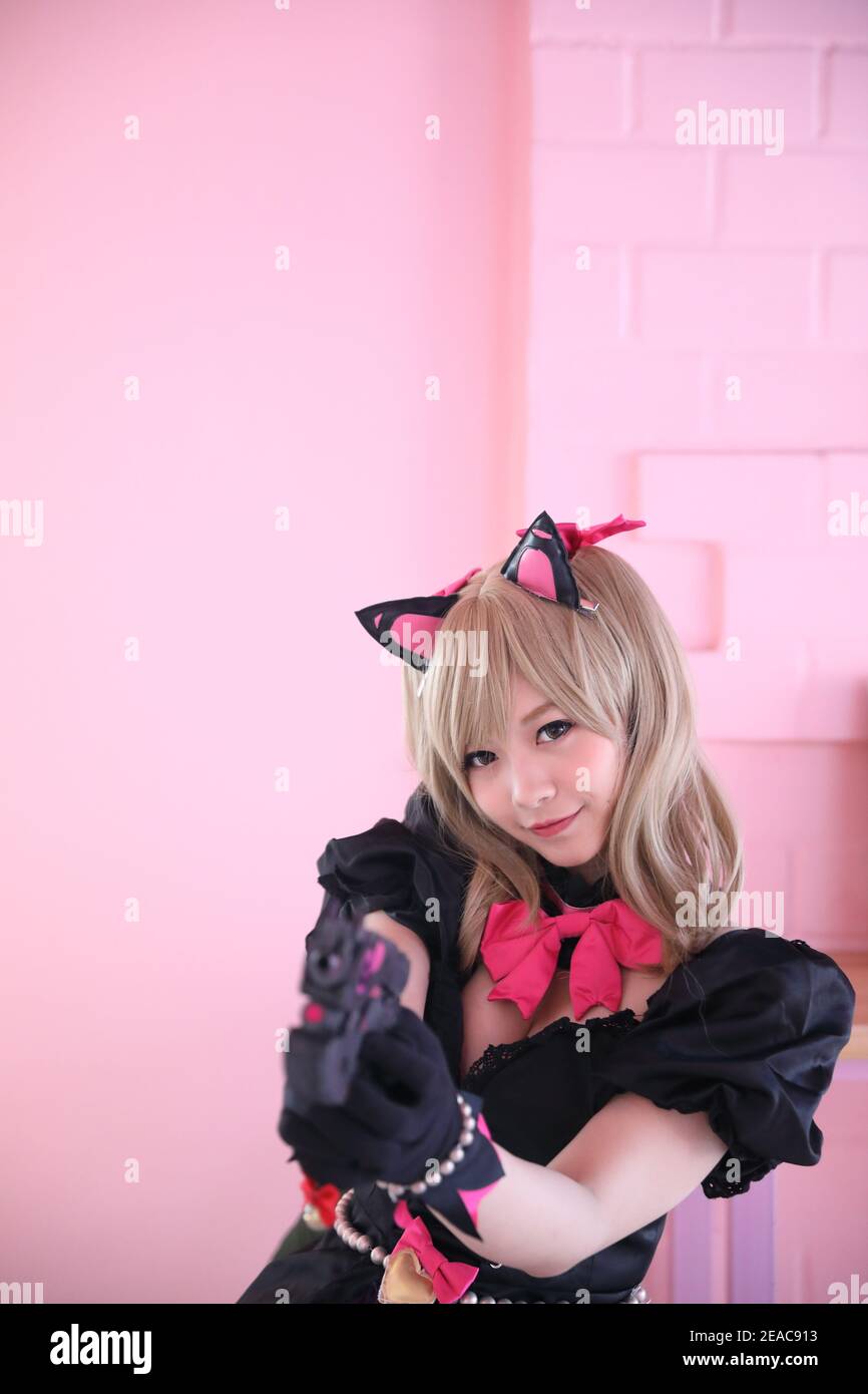 Japan anime cosplay , portrait of girl cosplay in pink room background ...