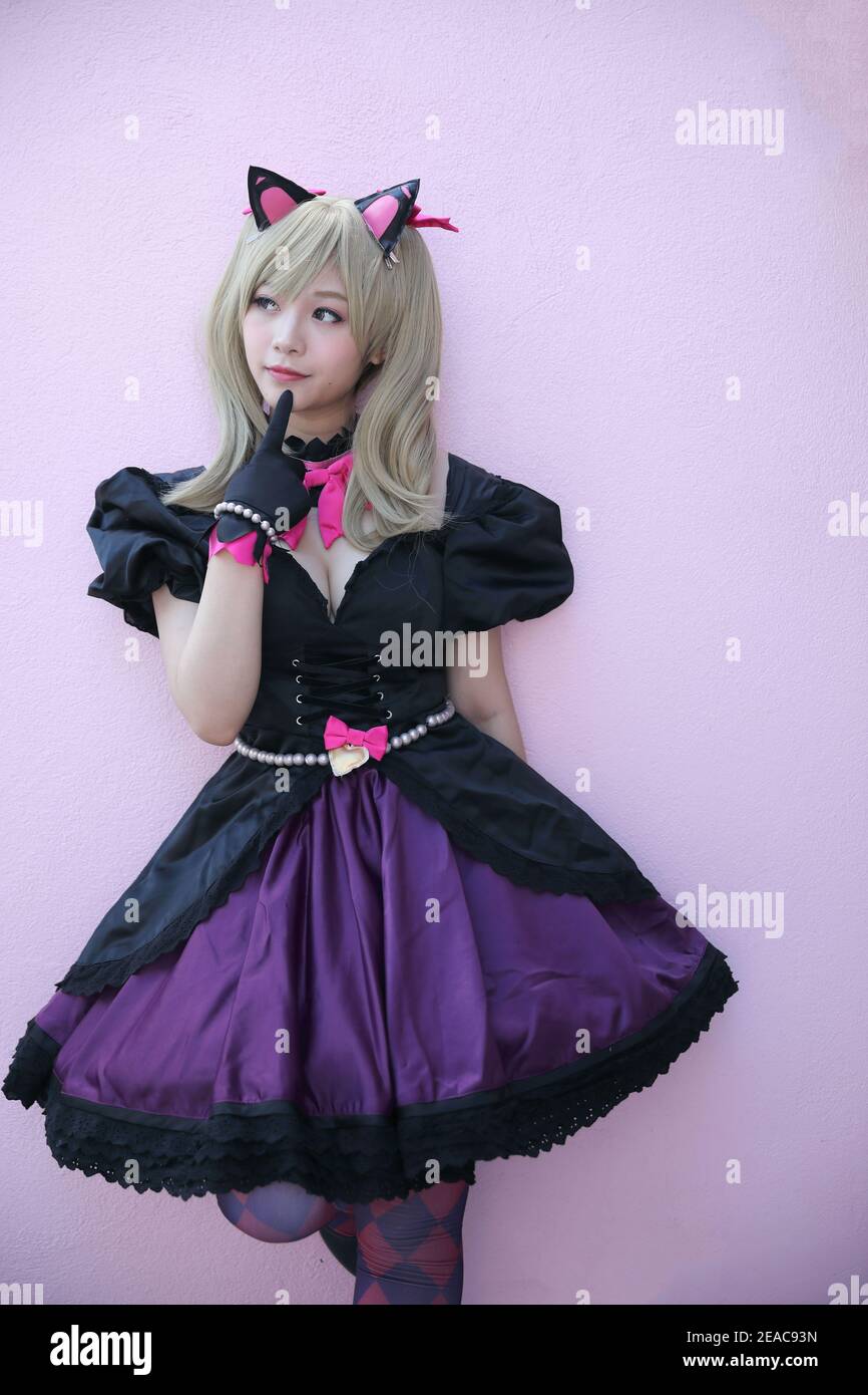 Japan anime cosplay , portrait of girl cosplay in pink room background ...