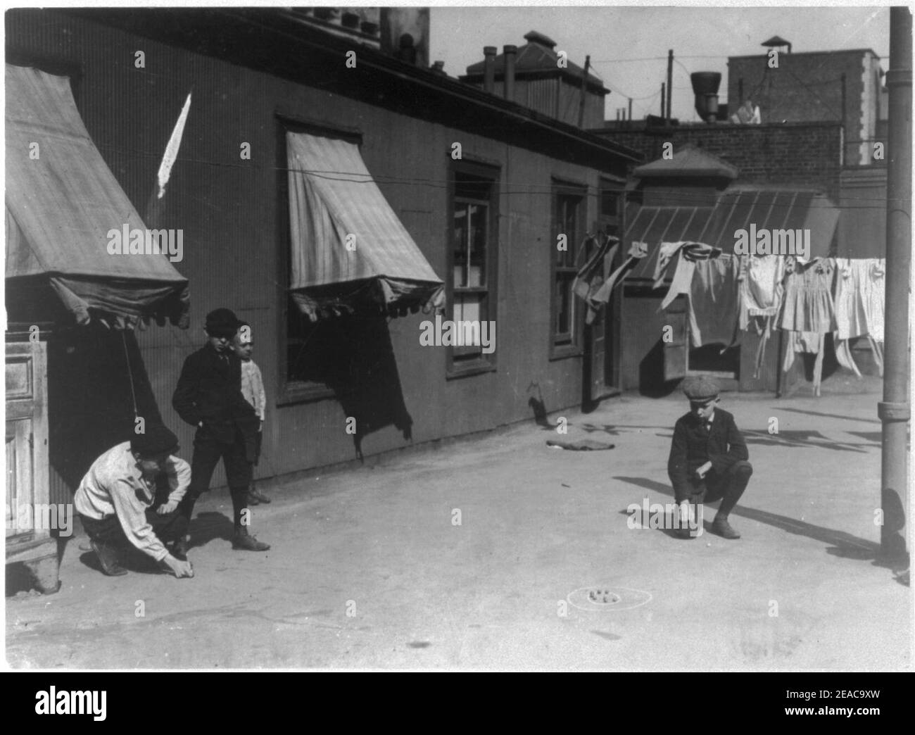 New York City - children on the street- hot weather street scene - Boys ...