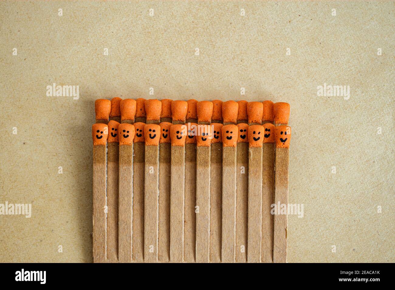 matchsticks with faces painted on the heads on old paper Stock Photo ...