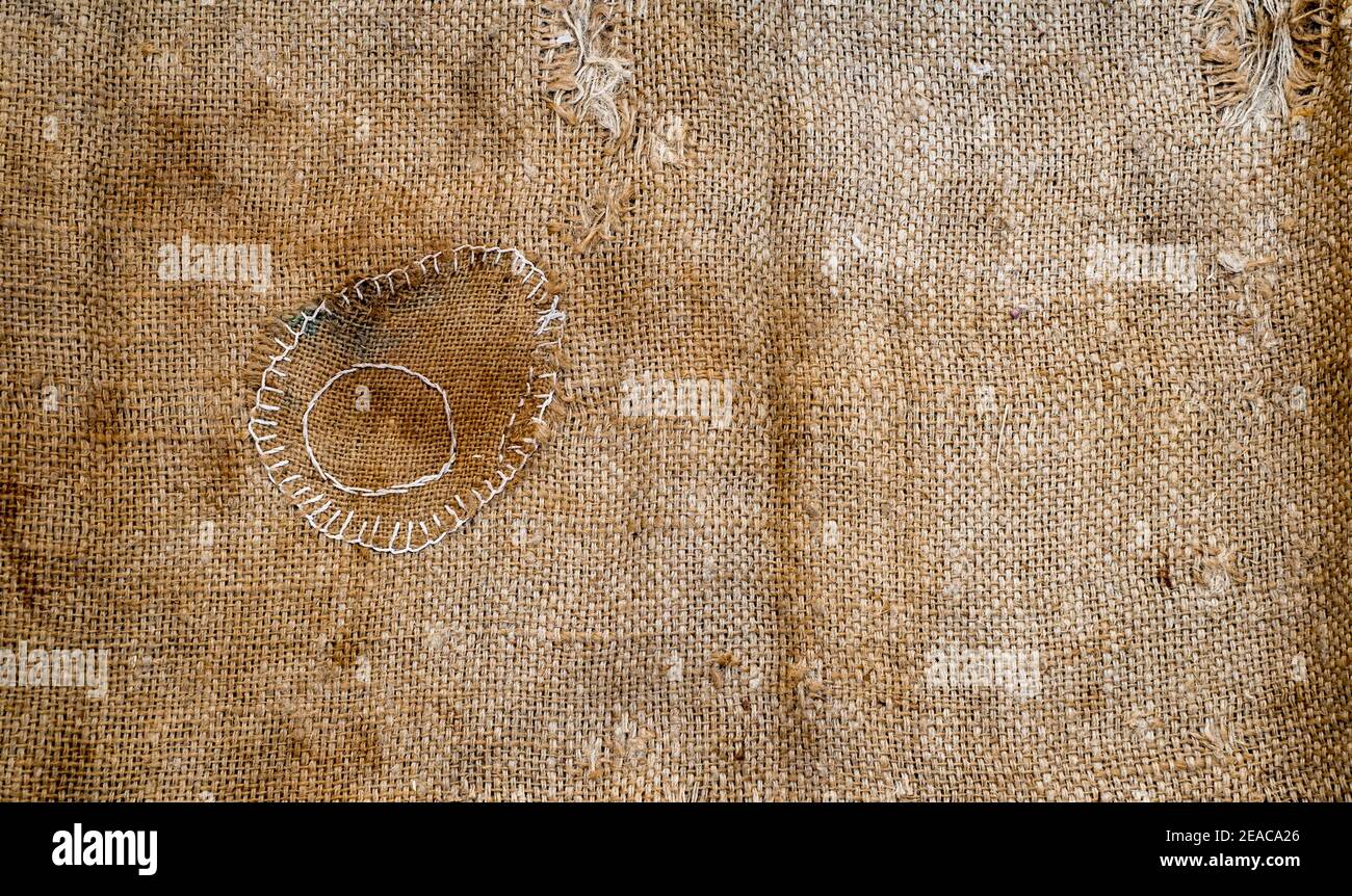 Hessian sack with hole hi-res stock photography and images - Alamy