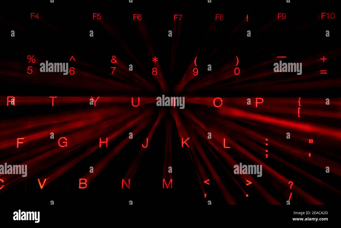 red backlit keyboard with zoom-out effect Stock Photo - Alamy