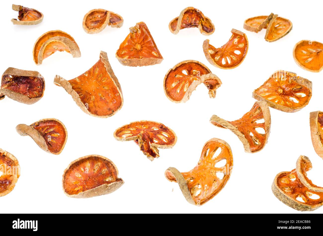 Pile of dried bael fruit isolated on white background. Studio Photo ...