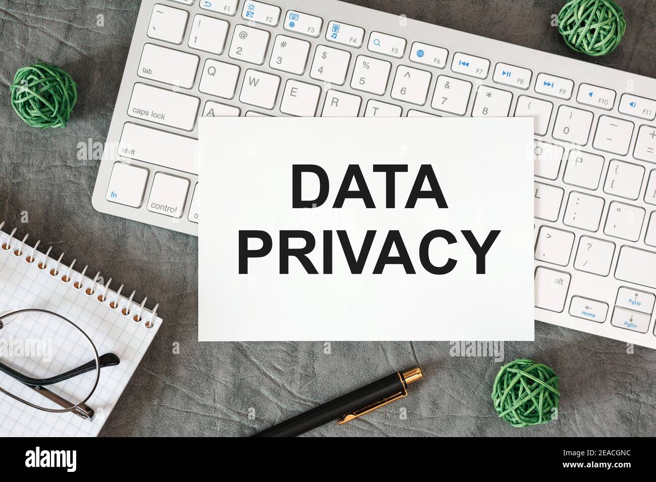 DATA PRIVACY is written in a document on the office desk with office ...