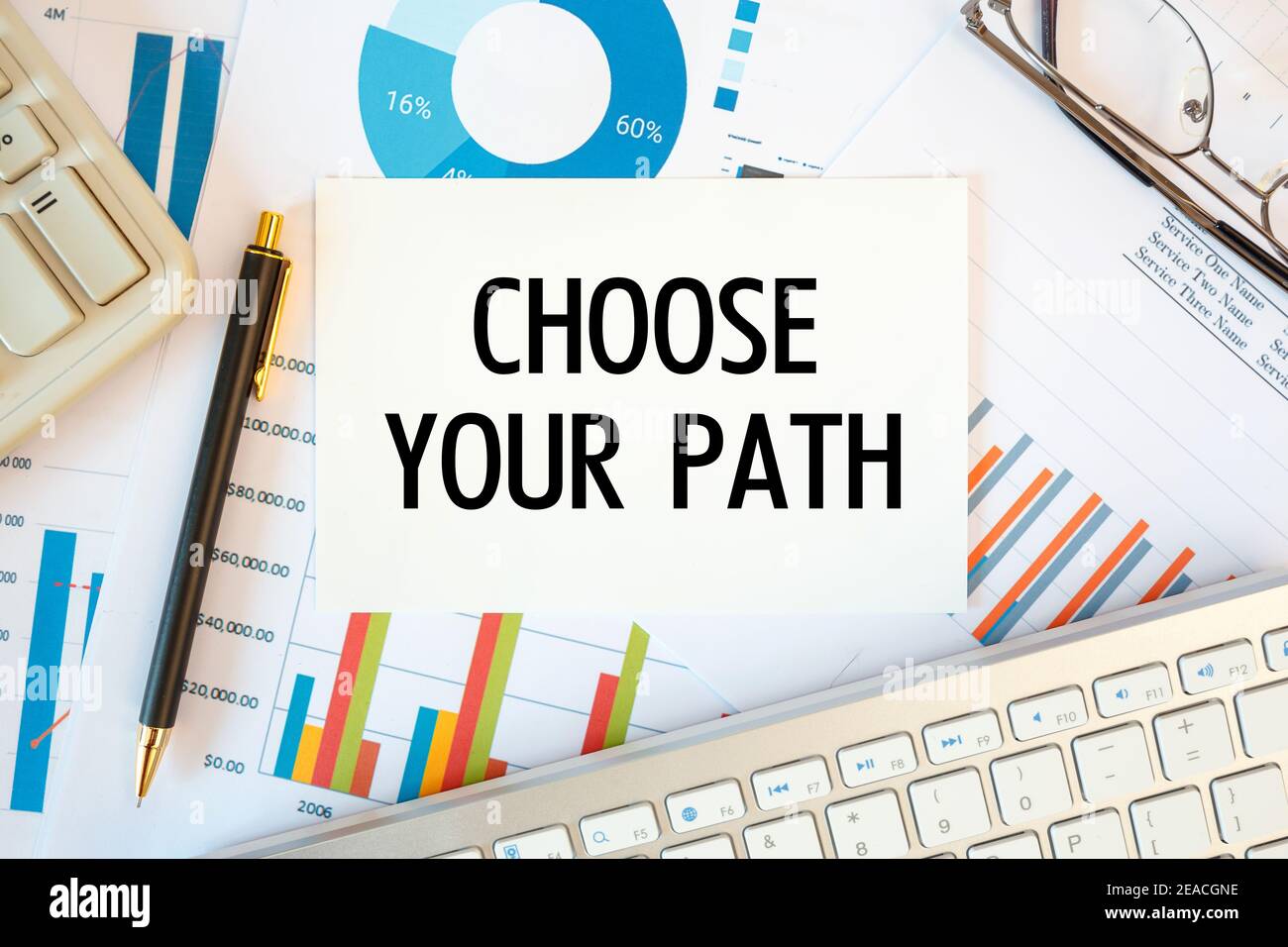 CHOOSE YOUR PATH is written in a document on the office desk with ...