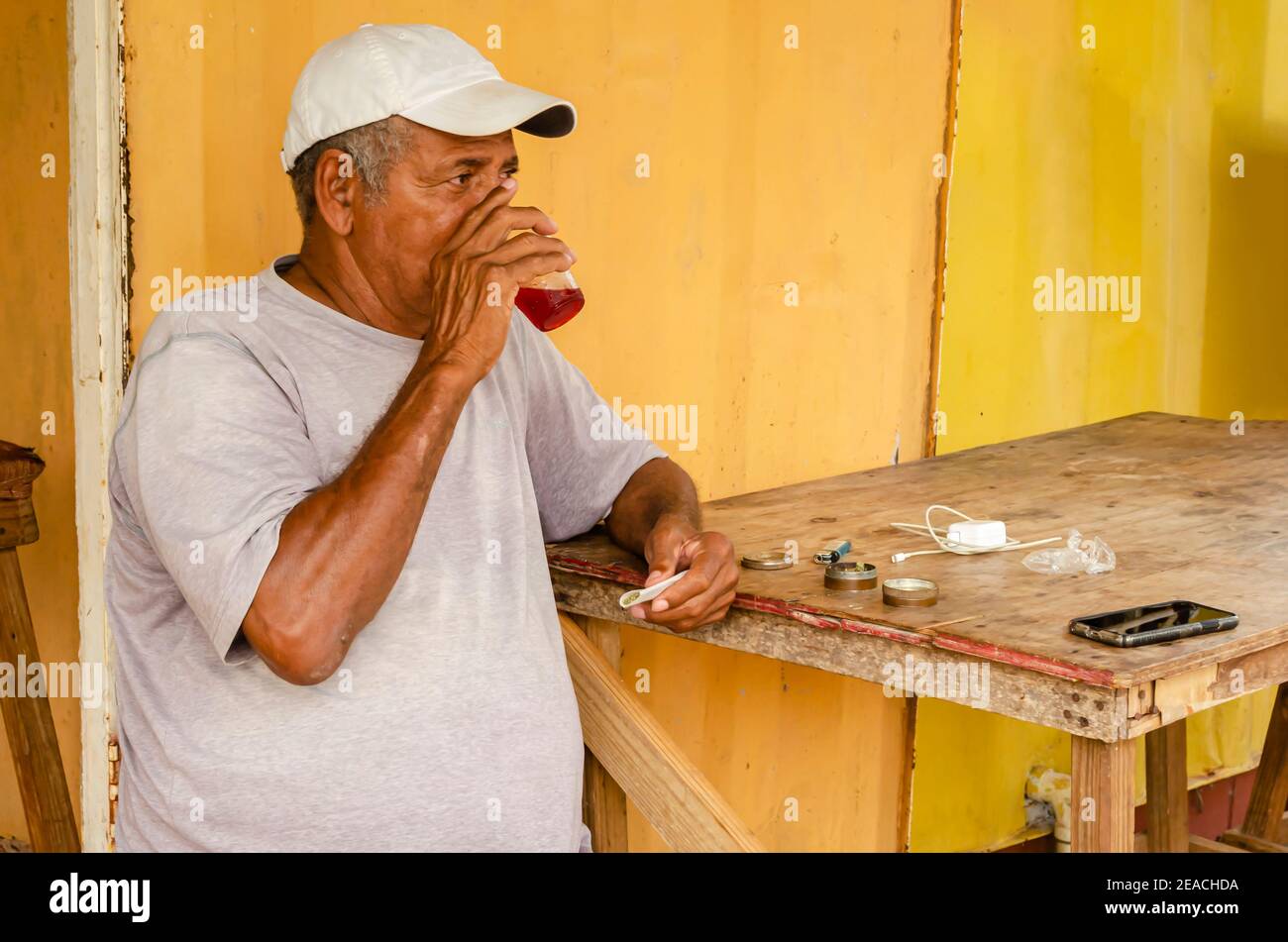 Man Drinking From A Plastic Glass Stock Photo - Alamy