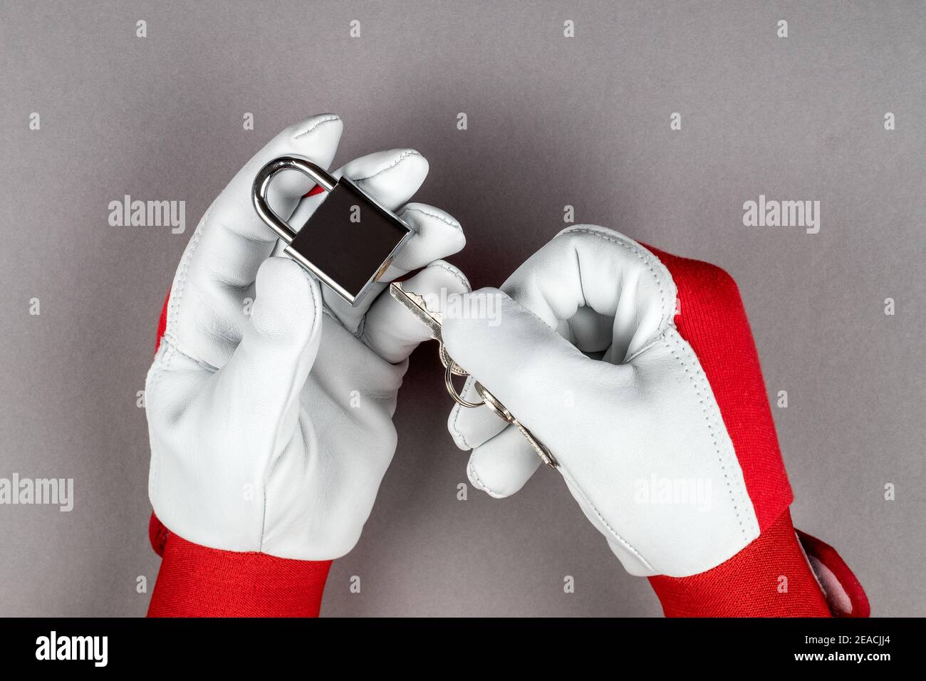 Padlock in a man's hands. Security and protection measures concept ...