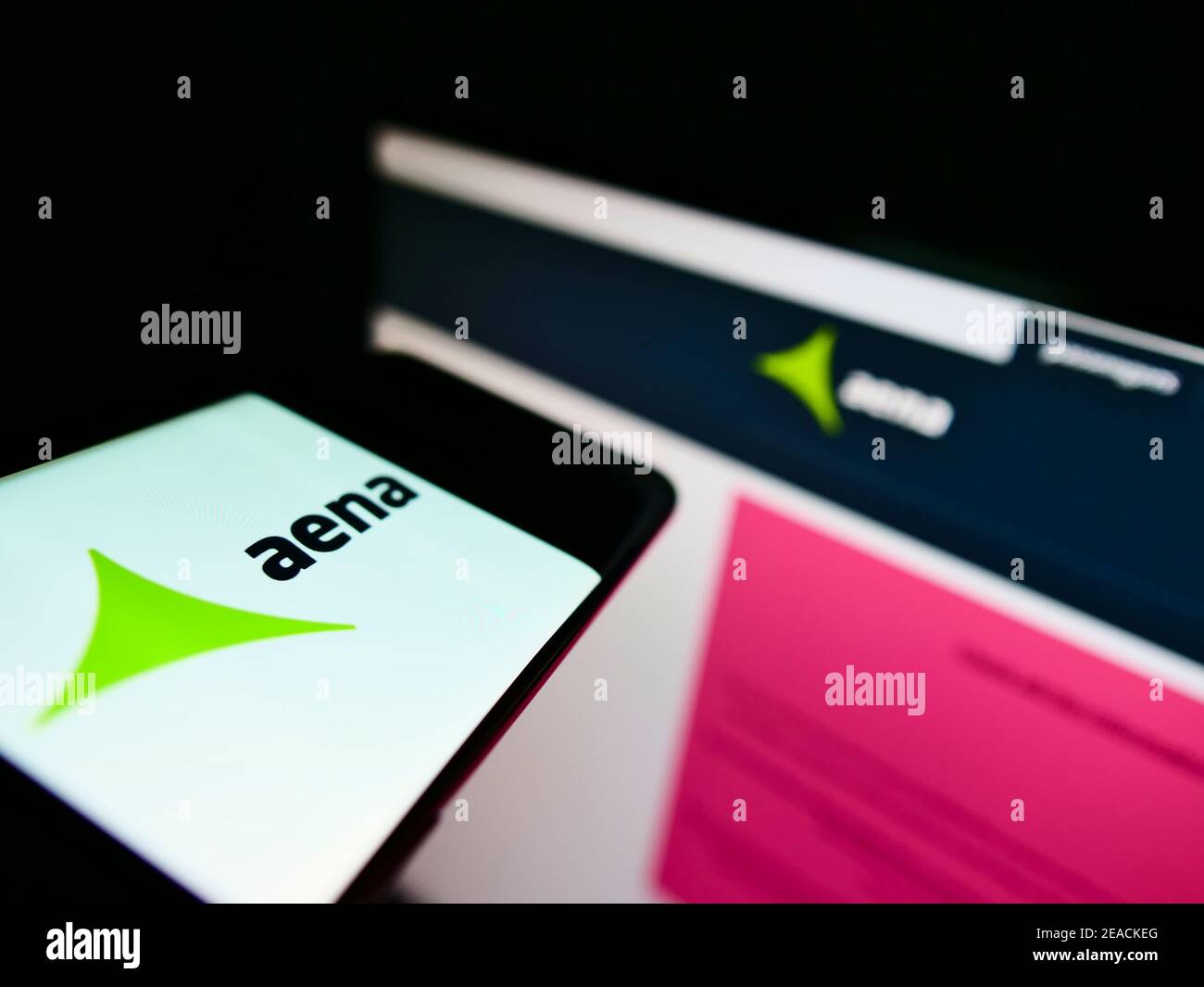 Smartphone with logo of Spanish airport operator Aena S.A. on screen ...