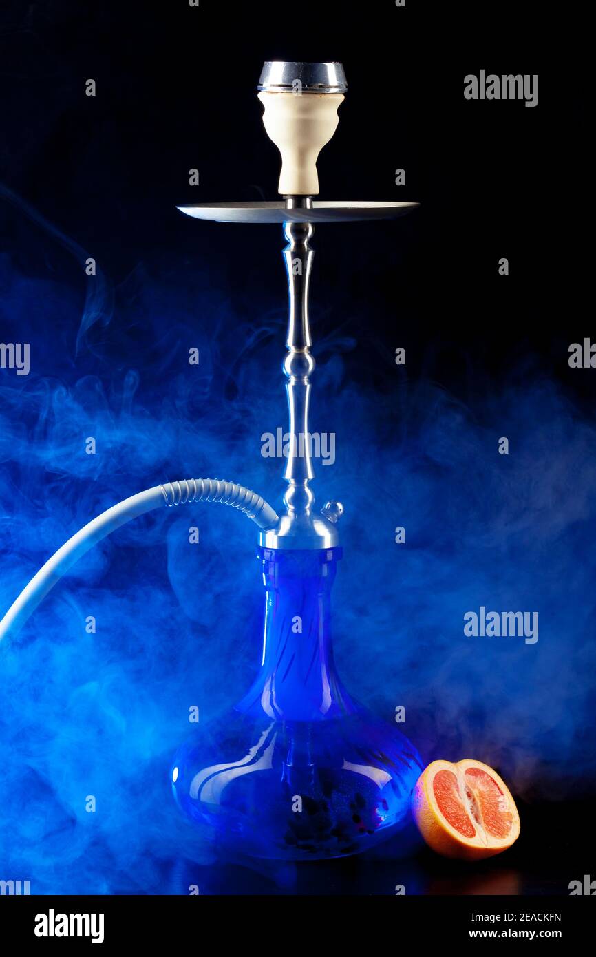Fruit flavor hookah isolated on black background Stock Photo - Alamy