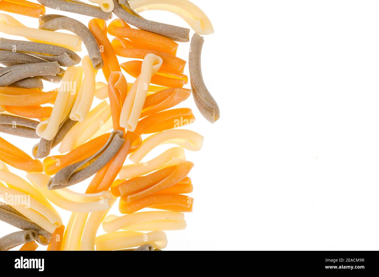 Pile of multi-colored pasta isolated on white background. Studio Photo ...