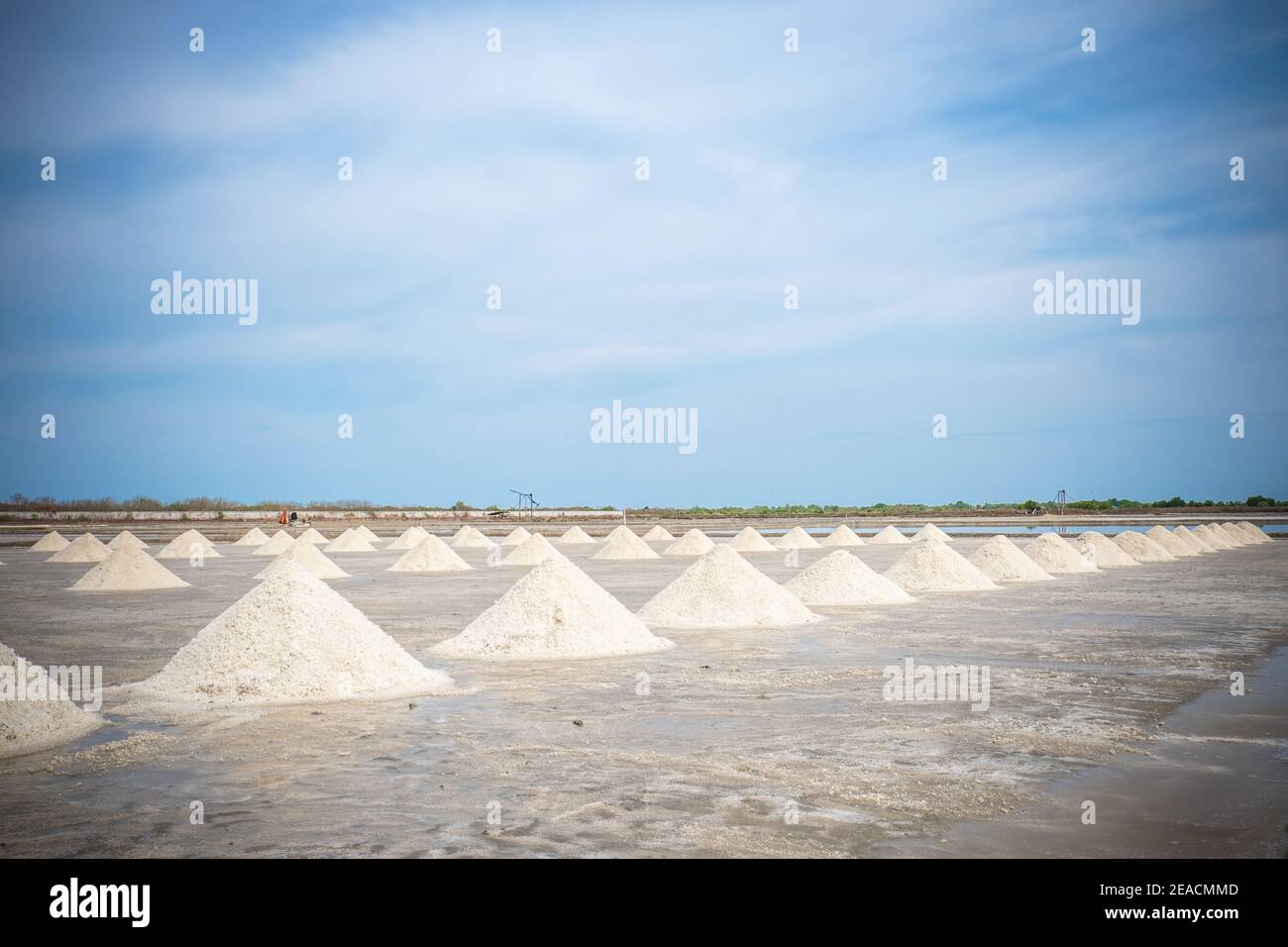 Farming salt,sea salt pile pyramid,raw salt from natural,blue sky ...