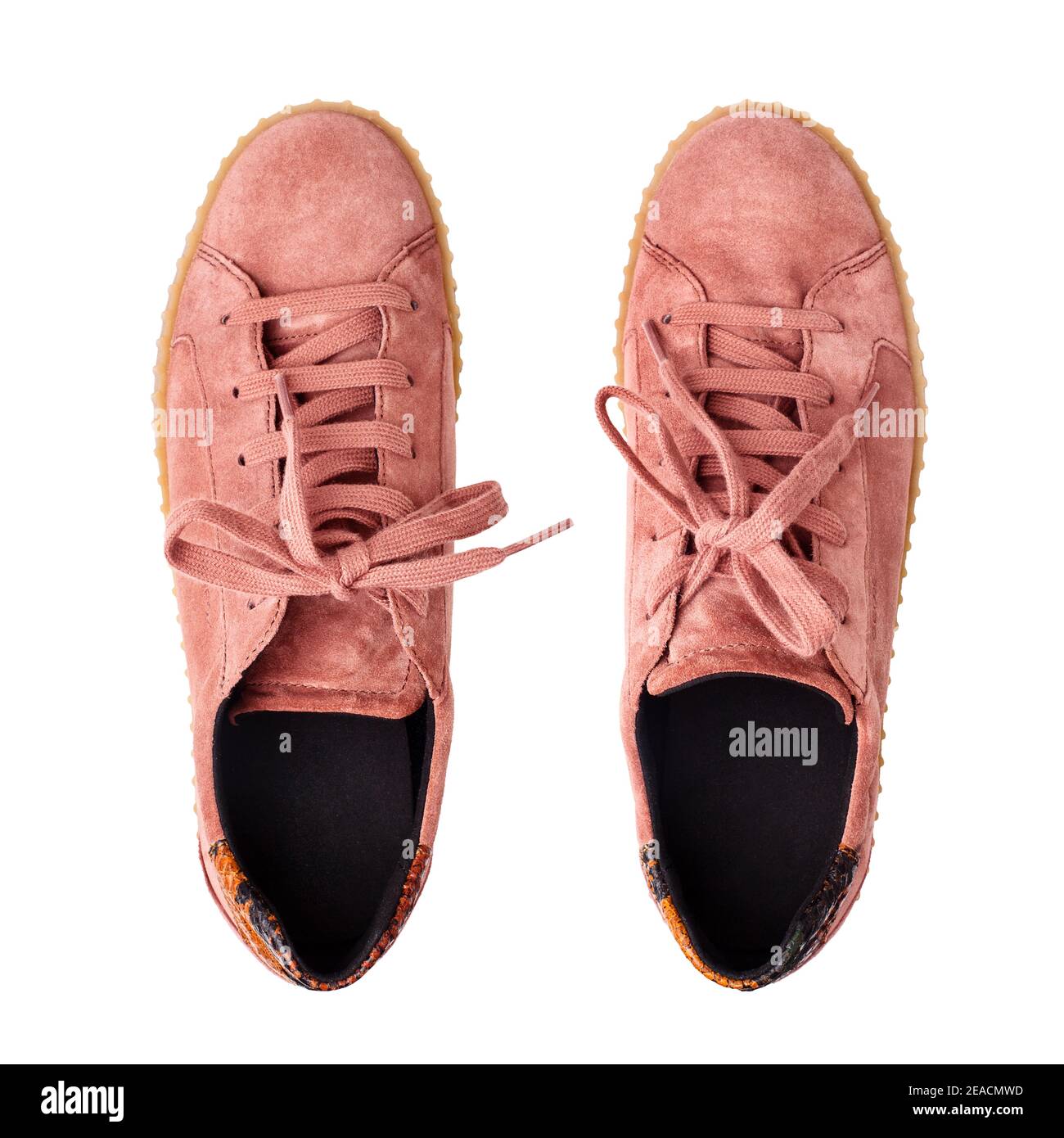 Light red suede sneakers white background isolated close up top view ...