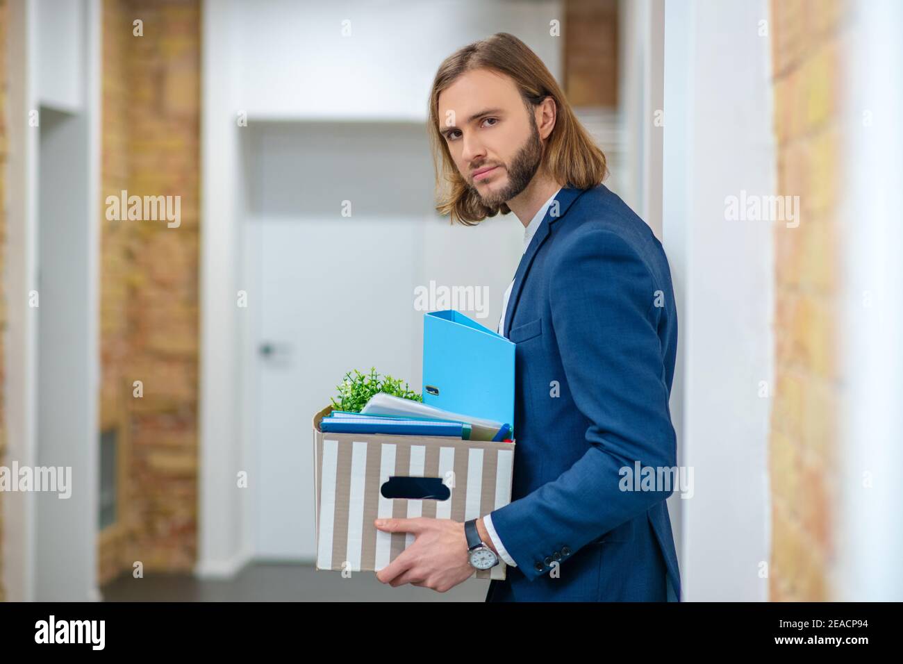 Unhappy man employee standing hi-res stock photography and images - Alamy